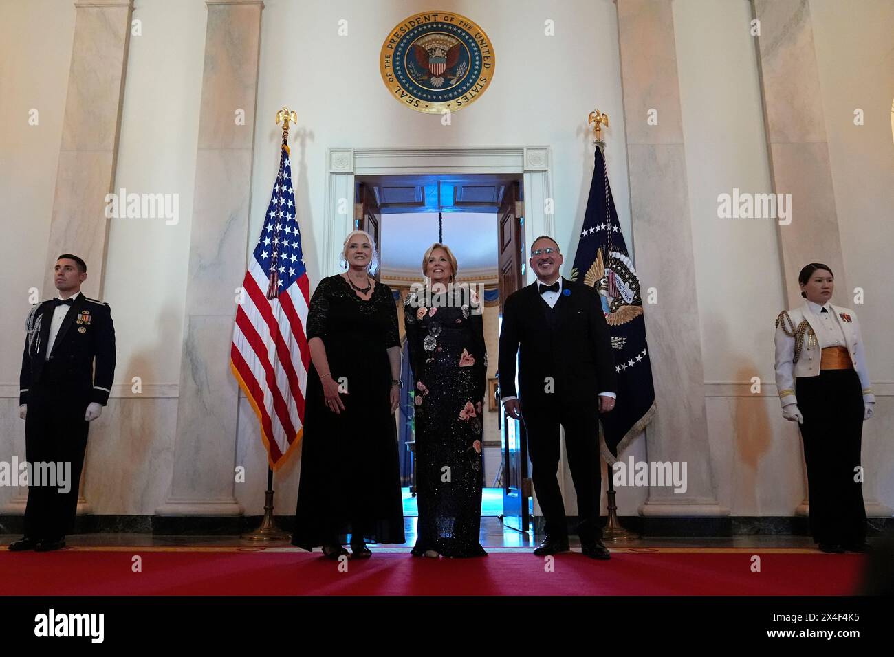 First lady Jill Biden, center, flanked by 2024 National Teacher of the ...