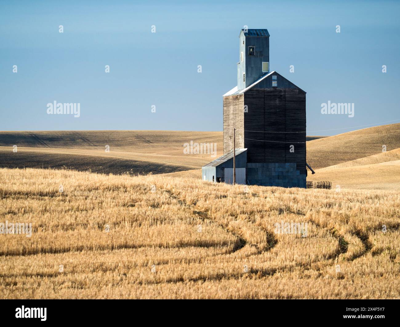 Old wooden silo in a cut field at harvest time in the Palouse Stock ...