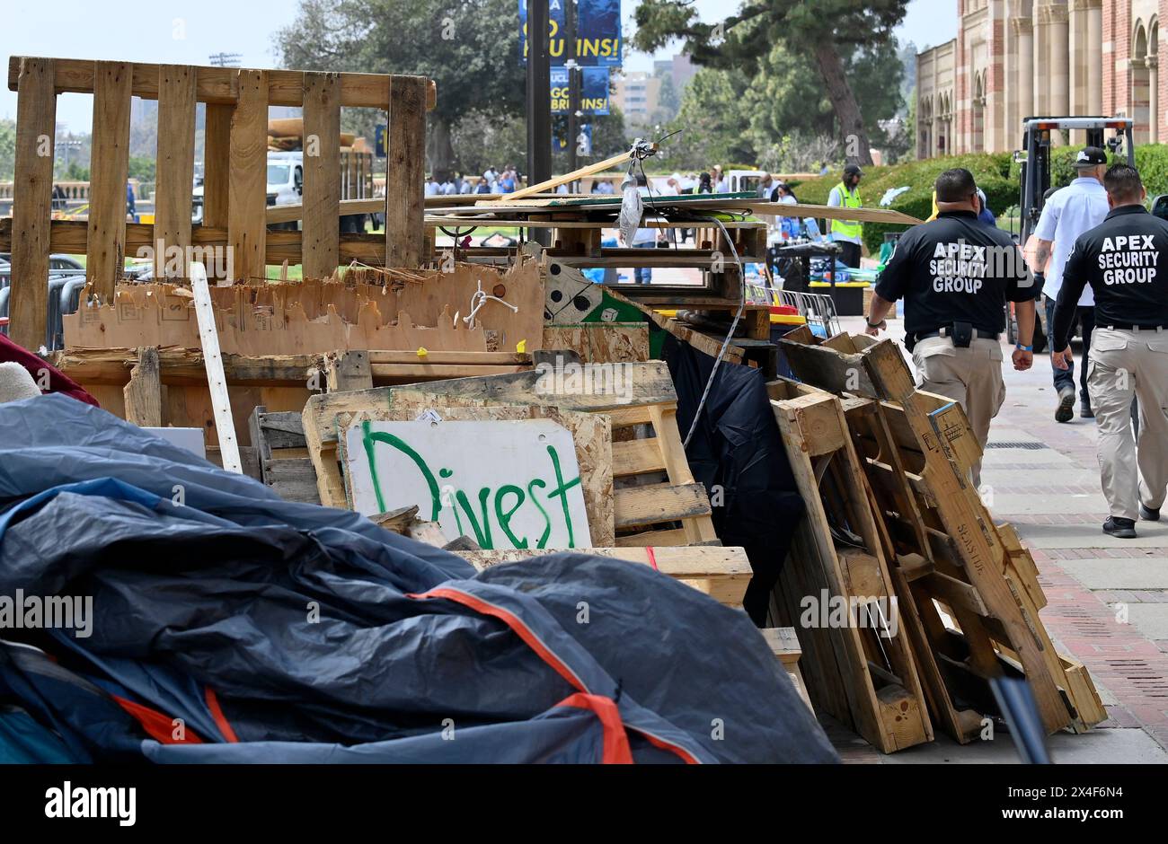 Los Angeles, United States. 02nd May, 2024. Workers clear debris from a ...