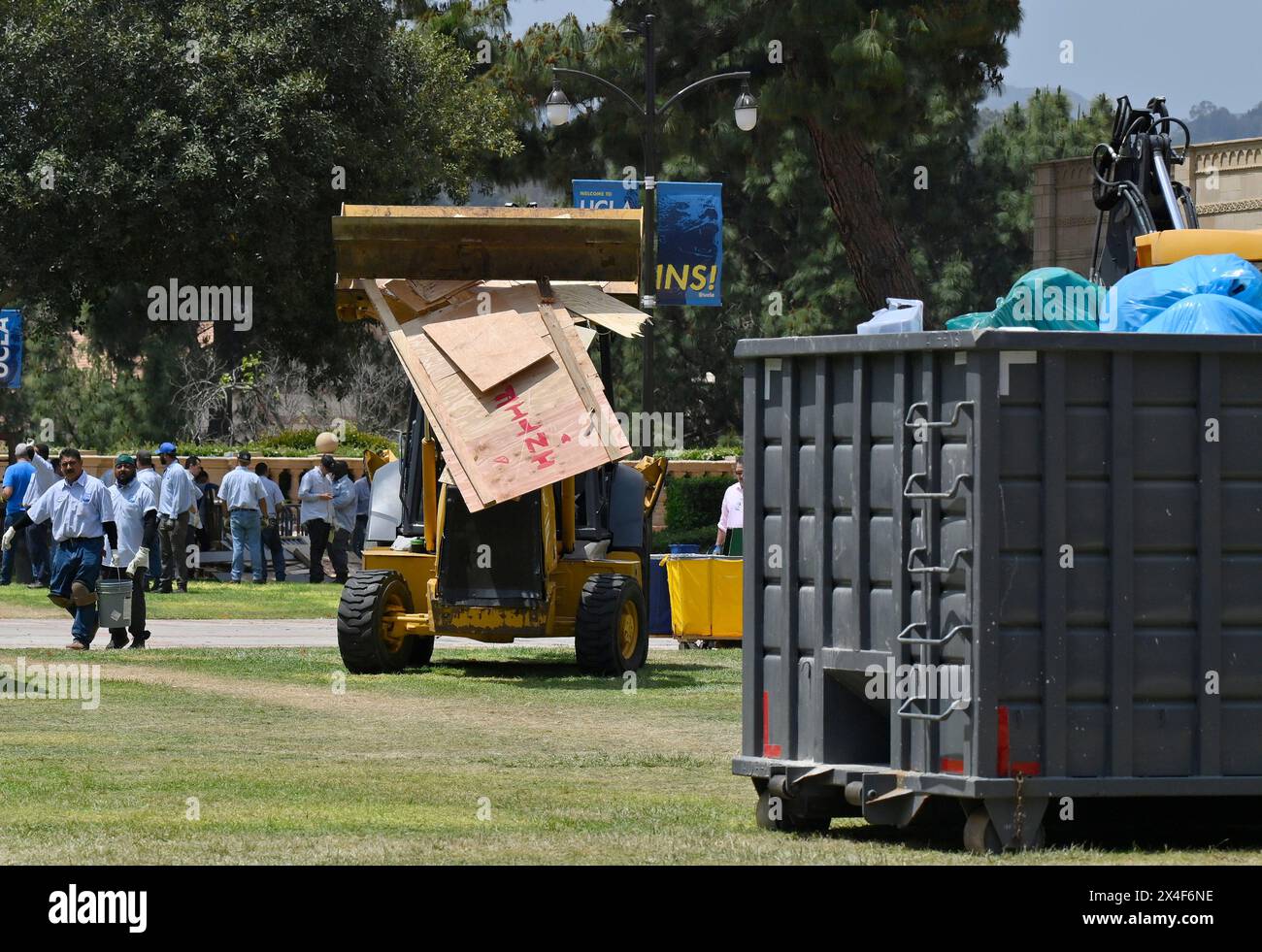 Los Angeles, United States. 02nd May, 2024. Workers clear debris from a ...