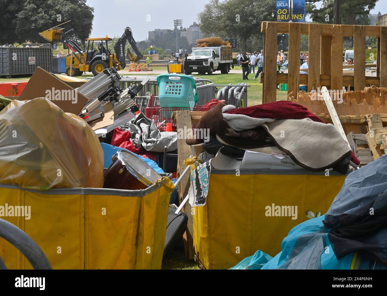 Los Angeles, United States. 02nd May, 2024. Workers clear debris from a ...
