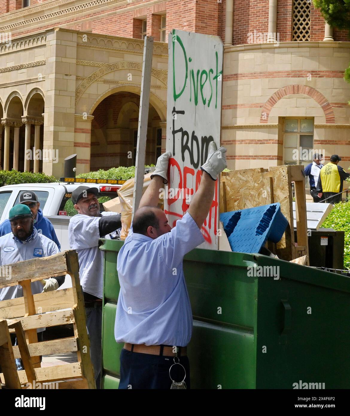 Los Angeles, United States. 02nd May, 2024. Workers clear debris from a ...