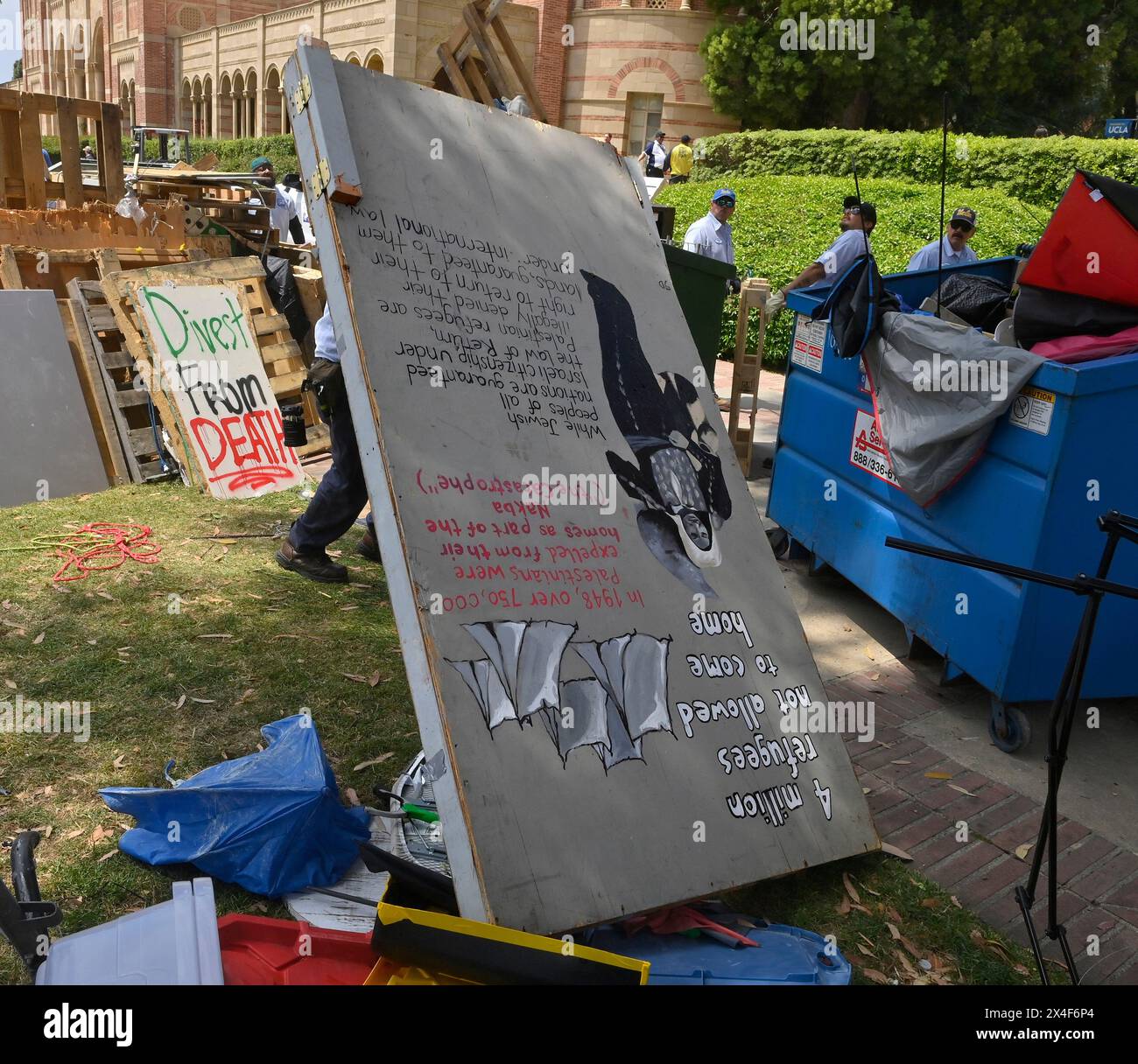 Los Angeles, United States. 02nd May, 2024. Workers clear debris from a ...