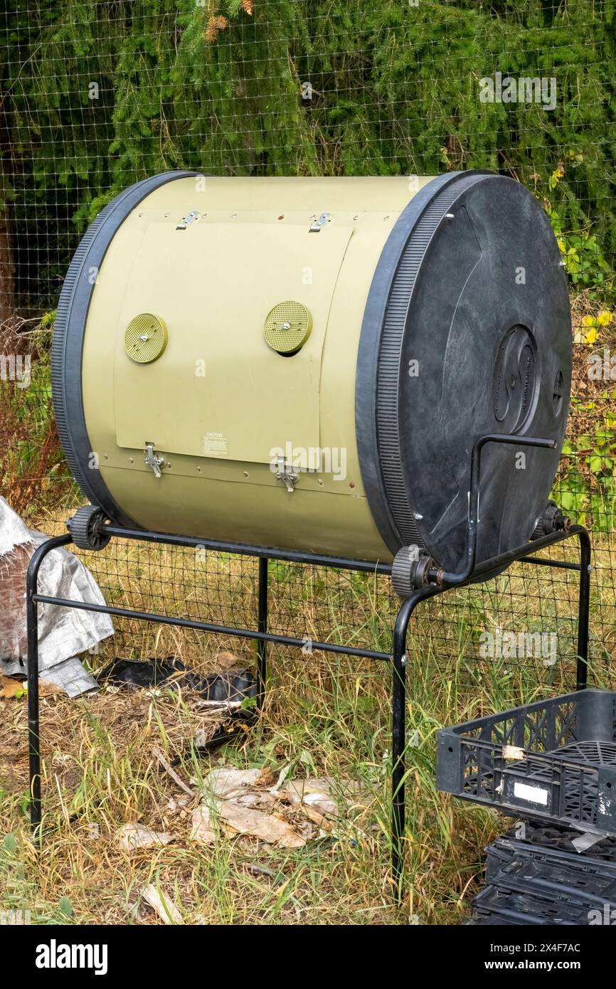 Port Townsend, Washington State, USA. Tumbling compost bin at a ...