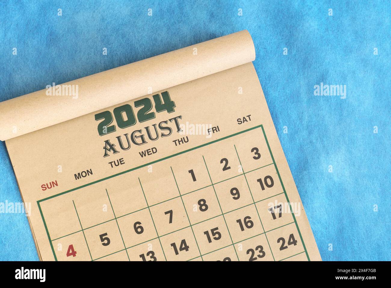 August 2024 calendar flat lay in blue background with copy space Stock ...