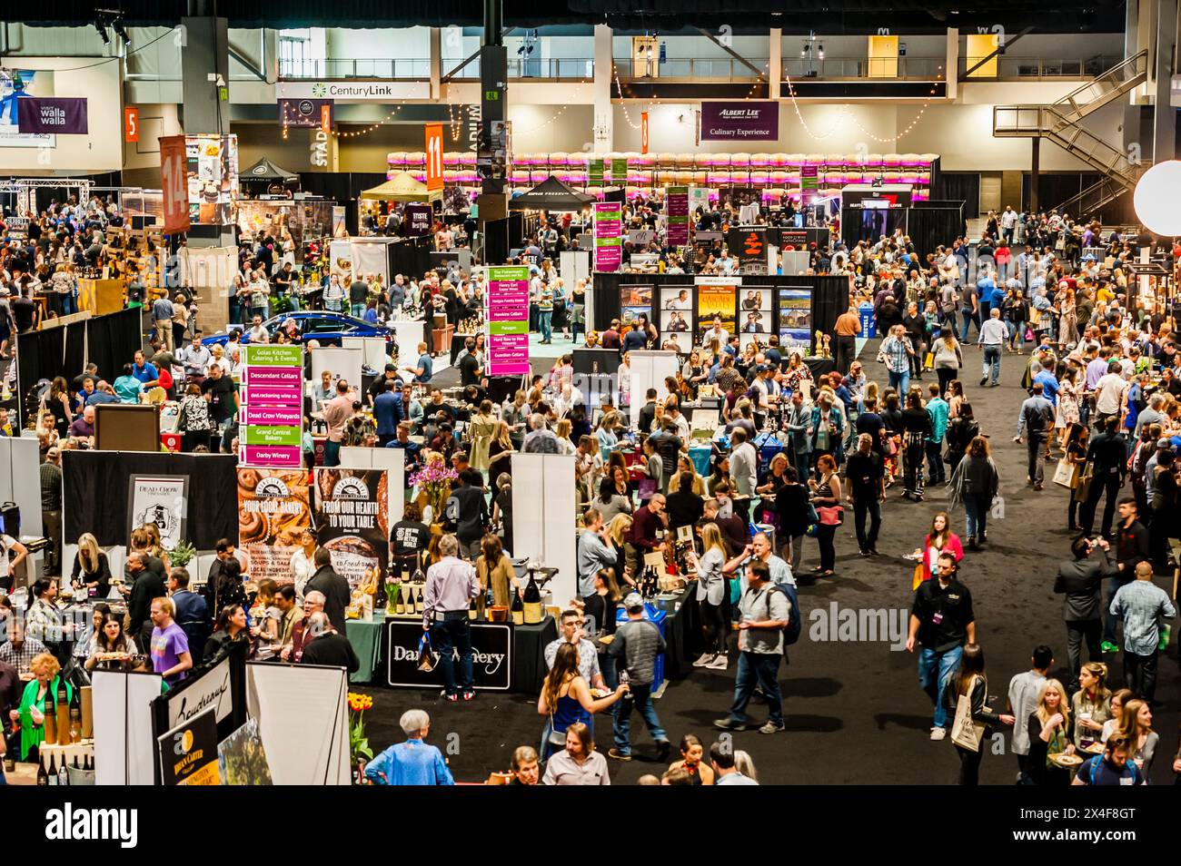 USA, Washington State, Seattle. Hundreds of wine lovers crowd The Grand ...