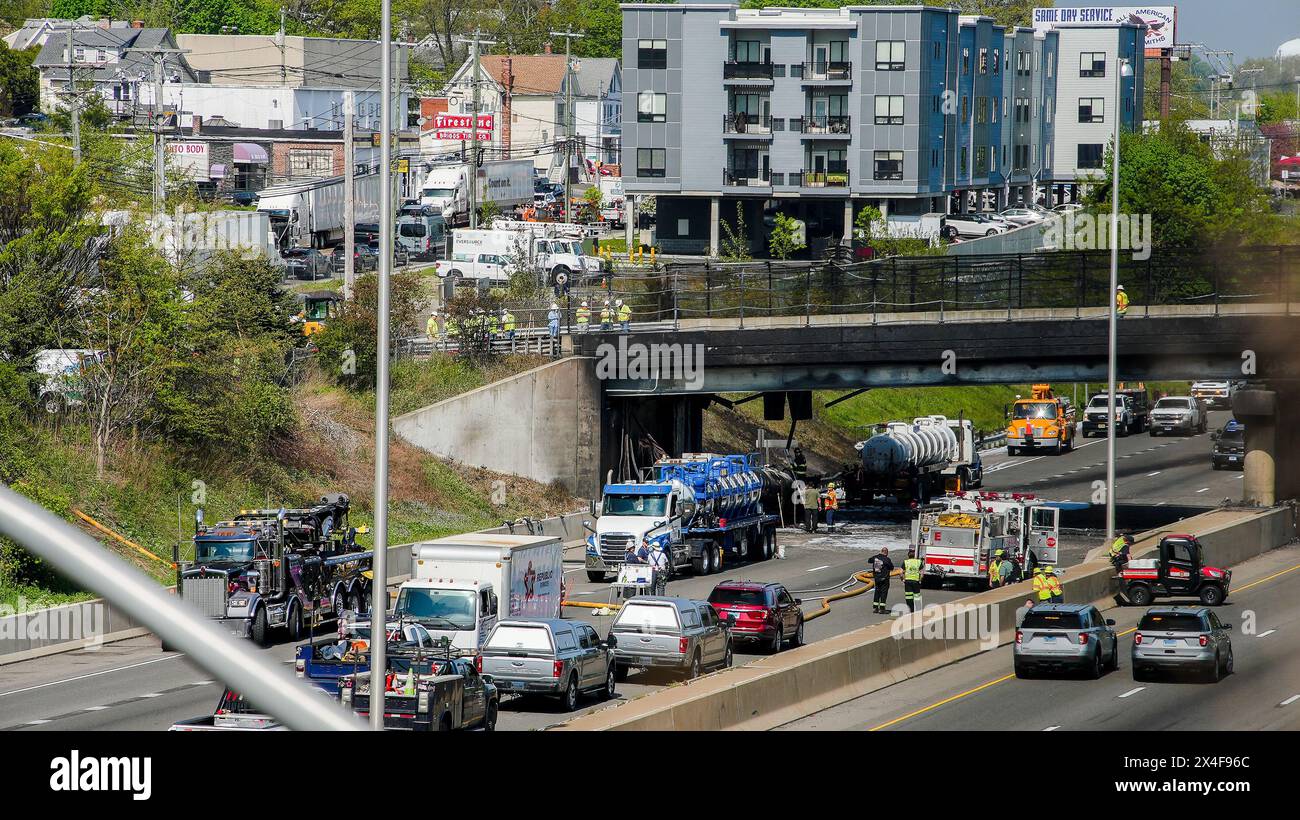 NORWALK, CT, USA- MAY 2, 2024: Cleaning I 95 after a tractor-trailer ...