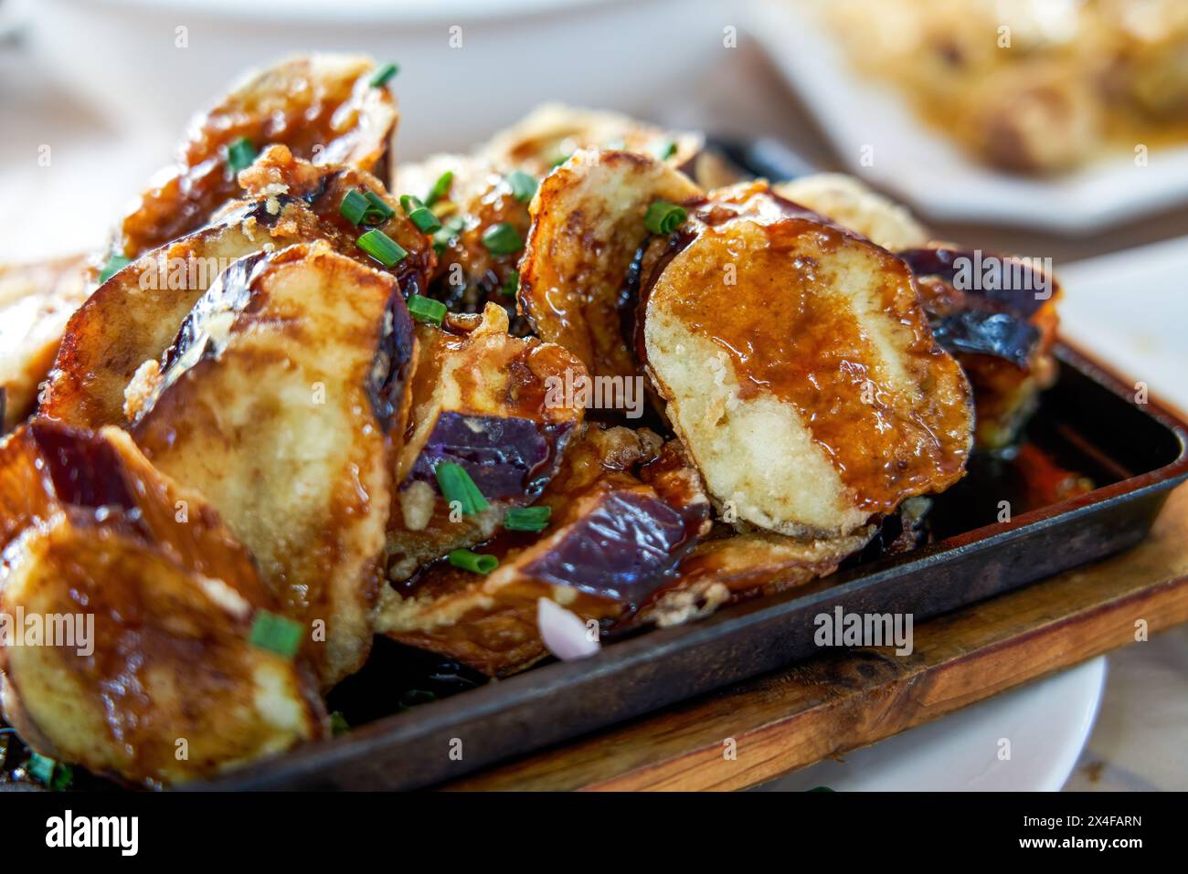 A delicious Chinese dish, deep fried eggplant stuffed with meat Stock ...