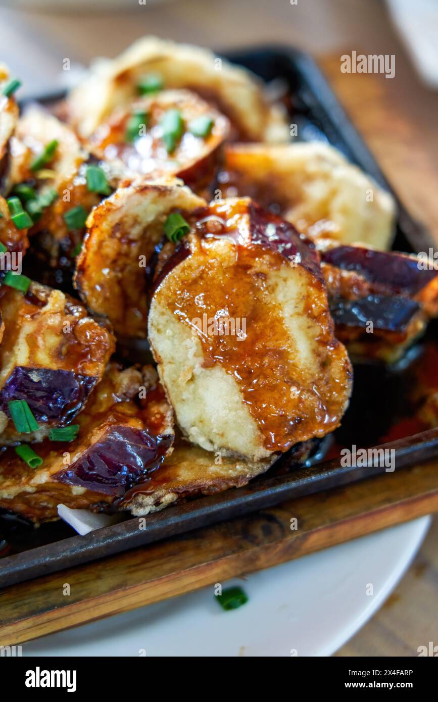 A delicious Chinese dish, deep fried eggplant stuffed with meat Stock ...