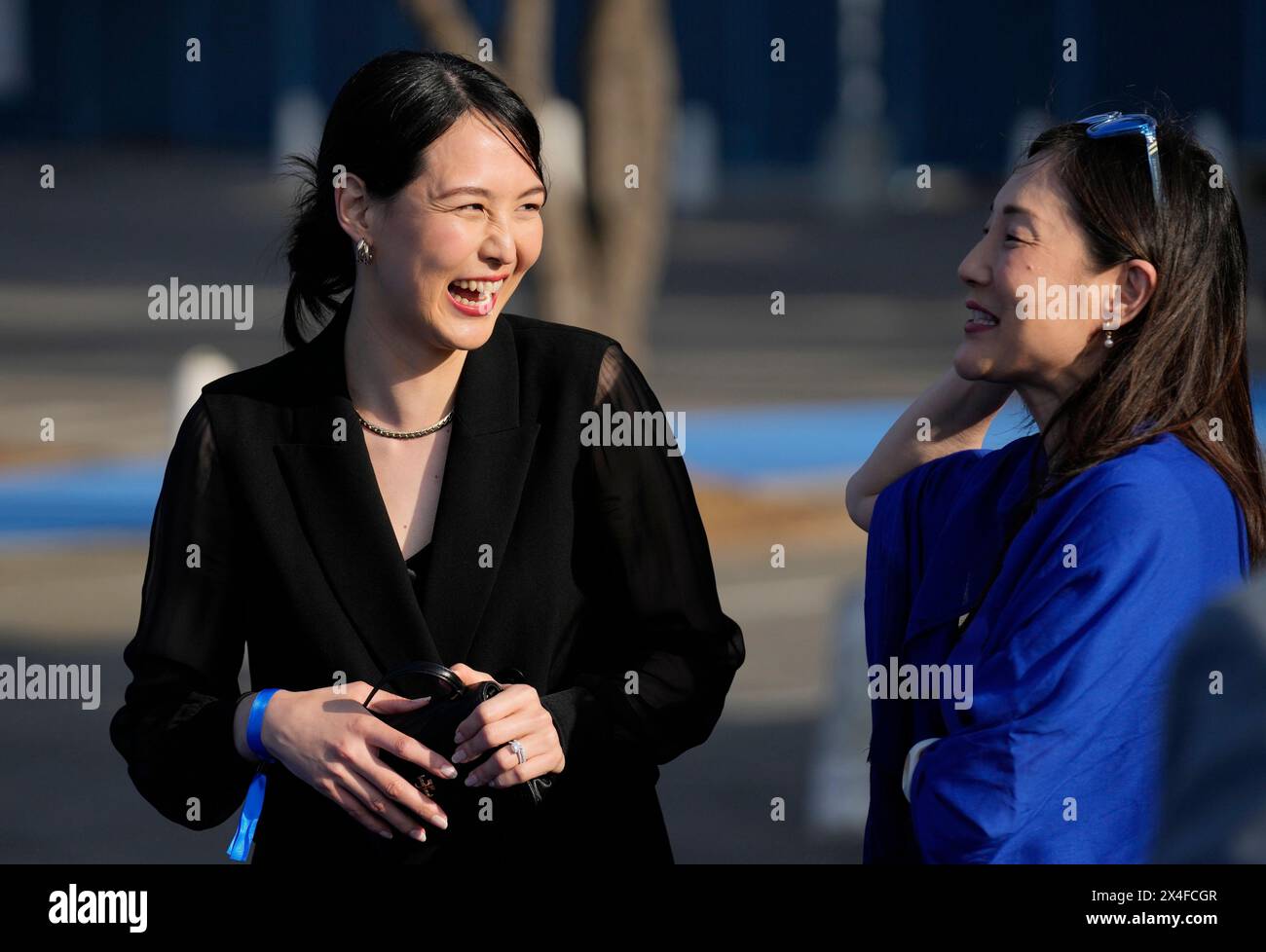 Mamiko Tanaka, left, the wife of Los Angeles Dodgers' Shohei Ohtani ...