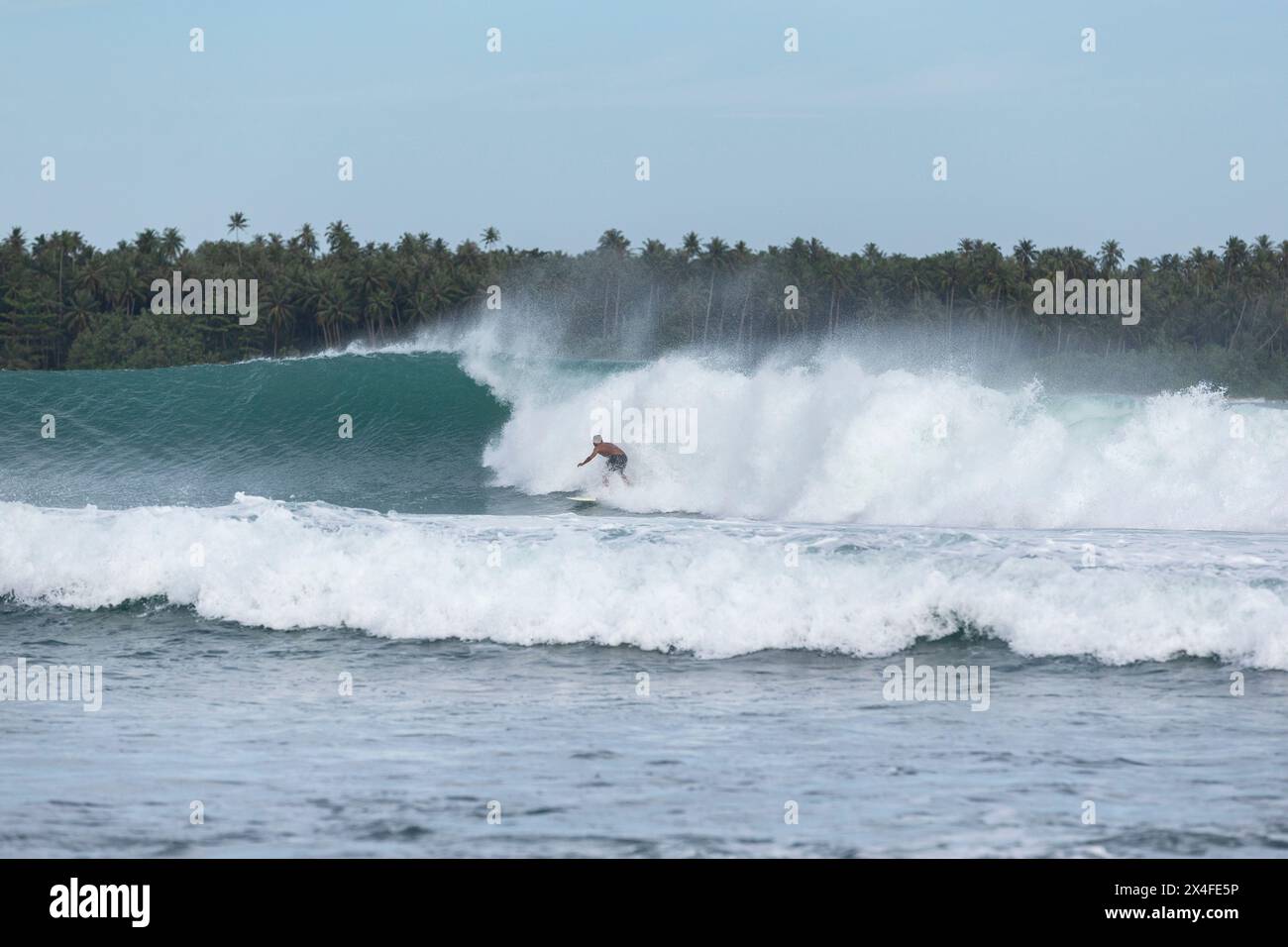 Surfing in Nias Island, North Sumatra, Indonesia Stock Photo - Alamy