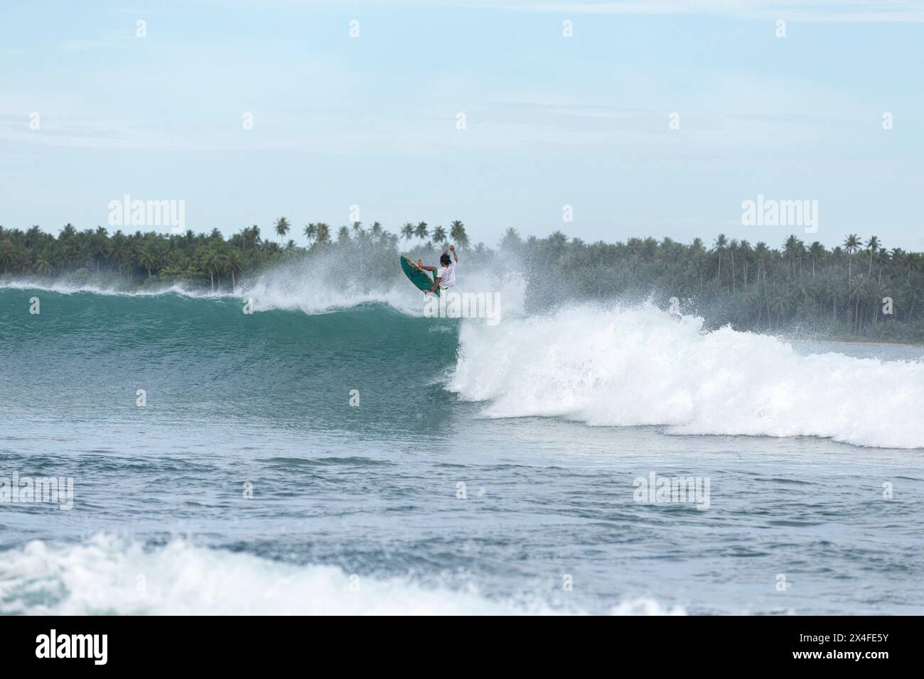 Surfing in Nias Island, North Sumatra, Indonesia Stock Photo - Alamy