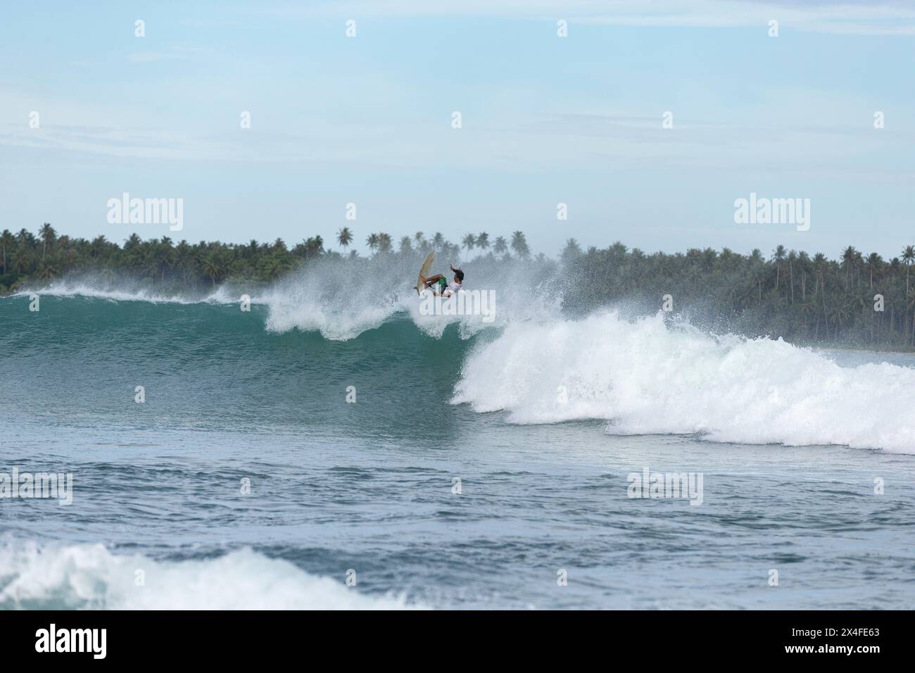 Surfing in Nias Island, North Sumatra, Indonesia Stock Photo - Alamy