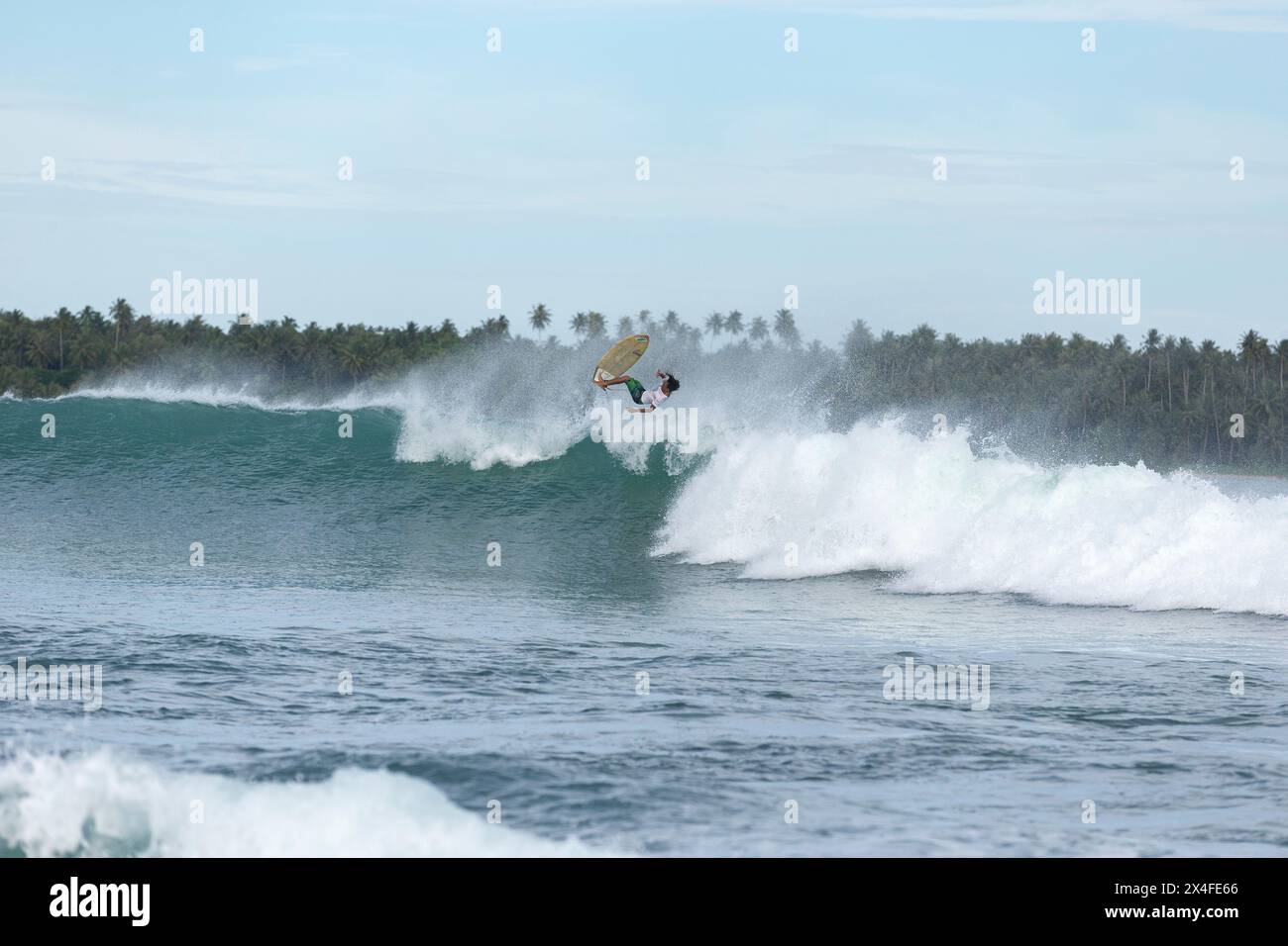 Surfing in Nias Island, North Sumatra, Indonesia Stock Photo - Alamy