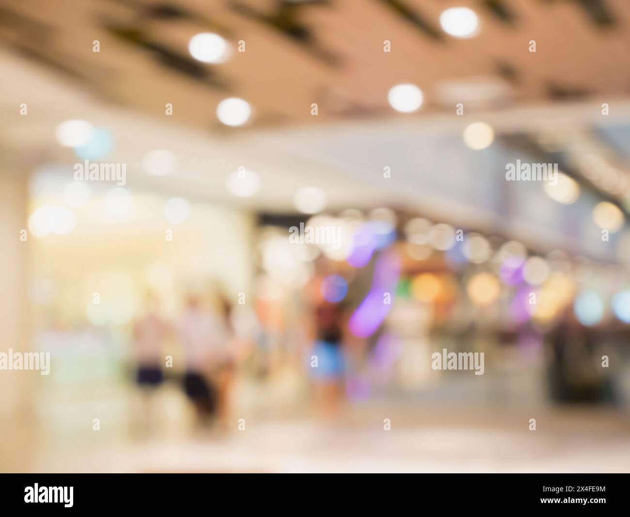 Shopping mall store blur background with bokeh light Stock Photo - Alamy