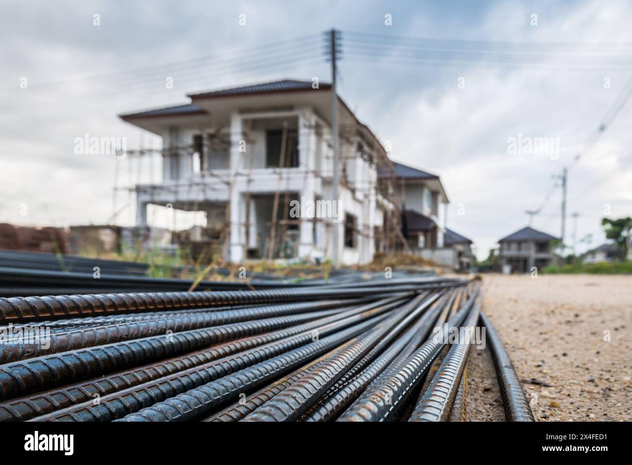steel rebar for reinforcement concrete at construction site with house ...