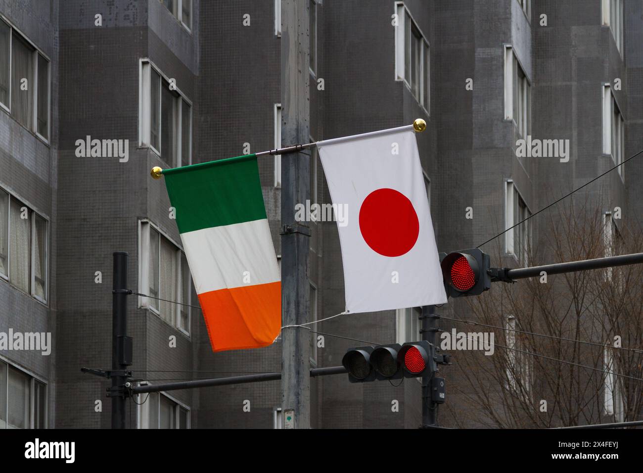 An Irish flag and a Japanese flag hang in the street during the 28th ...