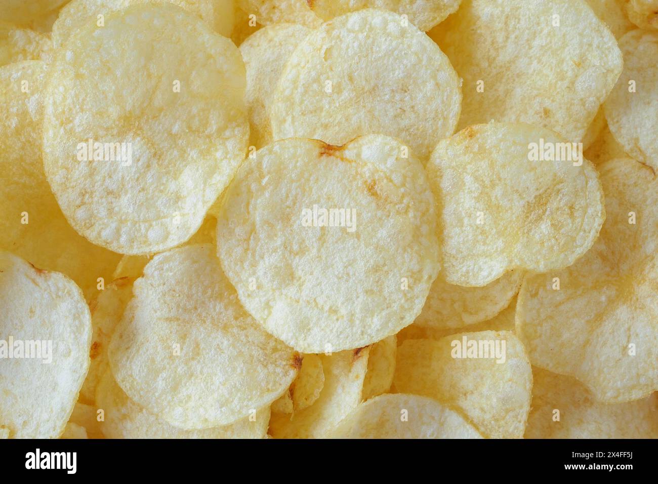 crispy potato chips snack texture background Stock Photo - Alamy