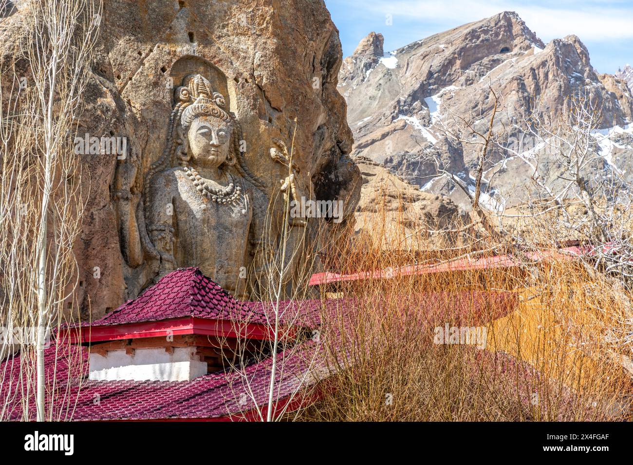 Large Buddha carved in stone in a hill at the Mulbekh Buddhist ...