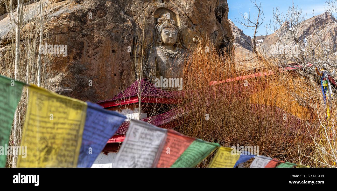 Large Buddha carved in stone in a hill at the Mulbekh Buddhist ...