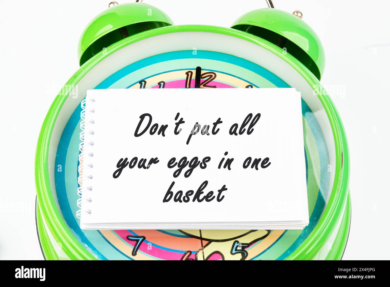 Don't put all your eggs in one basket Message on a business card on the ...