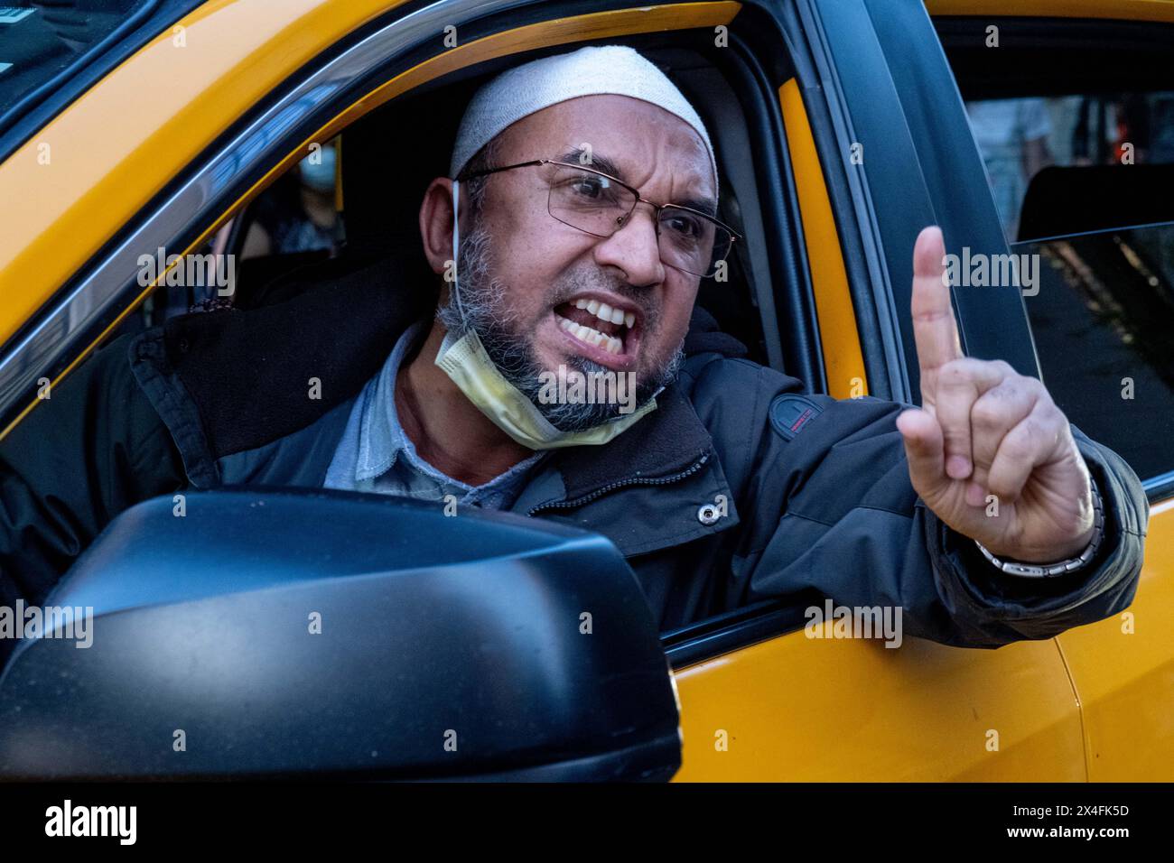 New York, United States. 02nd May, 2024. An angry cab driver yells at ...