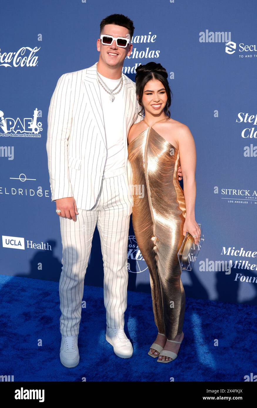 Los Angeles Dodgers' Bobby Miller and Natalie Loureda pose together at ...