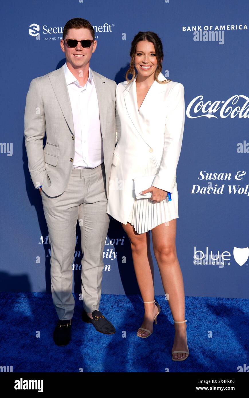 Los Angeles Dodgers' Will Smith and his wife Cara pose together at the ...