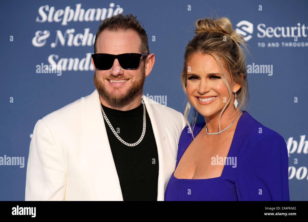 Los Angeles Dodgers' Max Muncy and his wife Kellie pose together at the ...