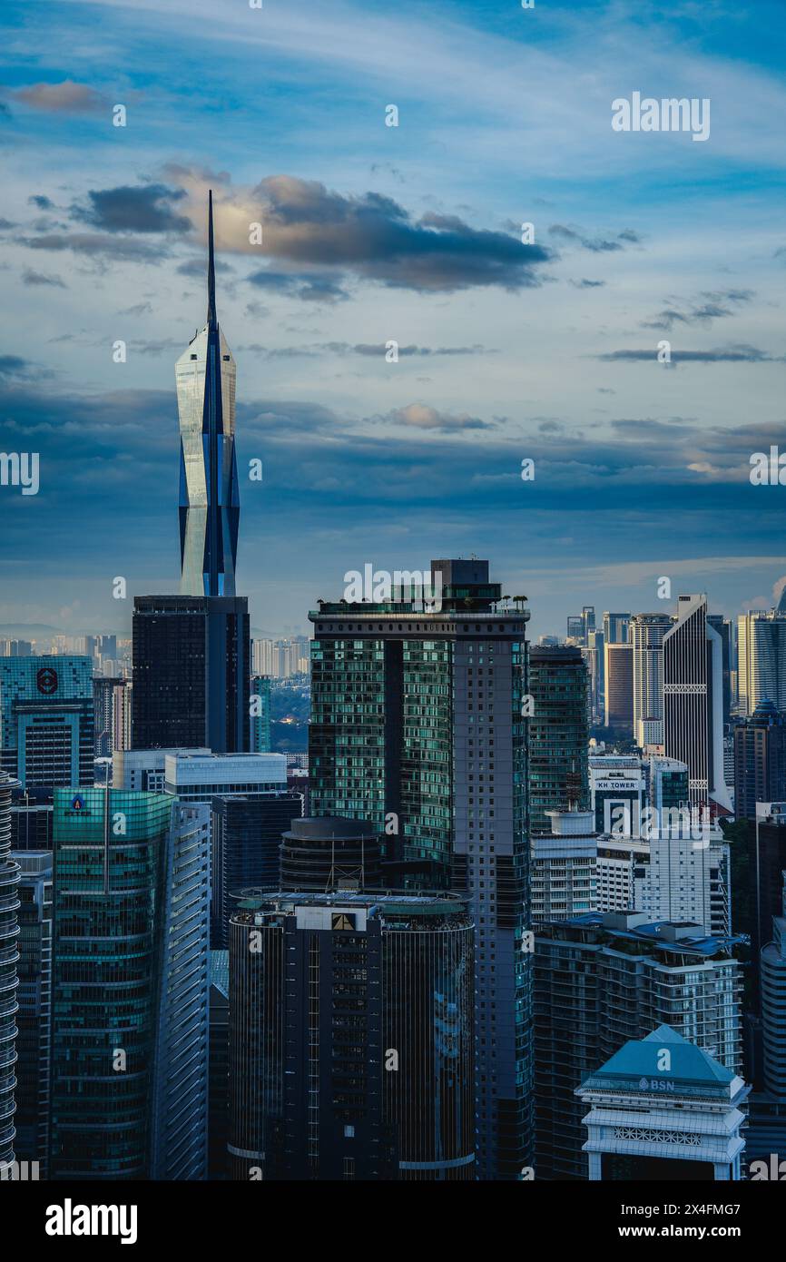 A dynamic vertical view of a towering skyscraper rising prominently ...