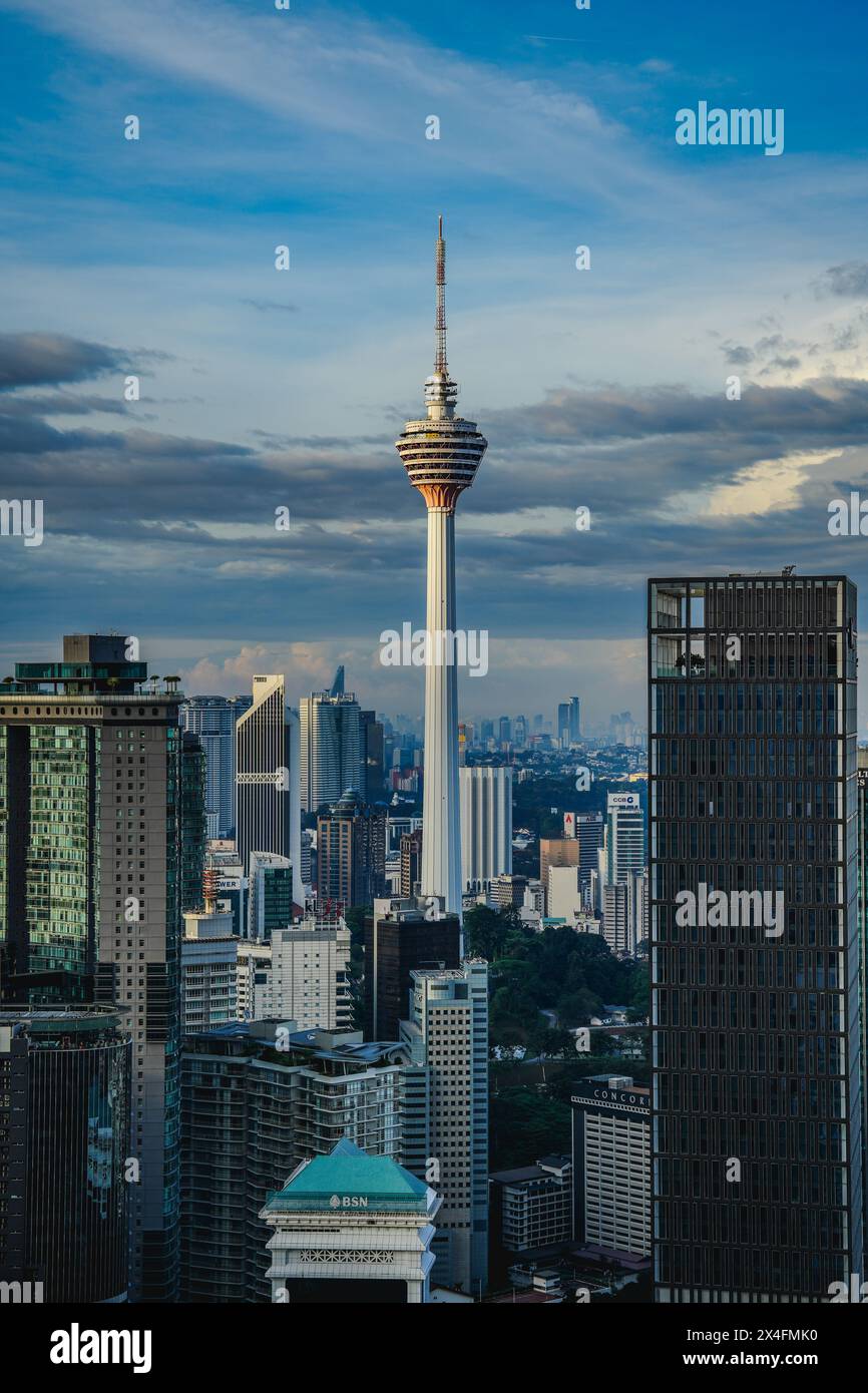 A breathtaking skyline view vertically shot featuring an iconic telecom ...
