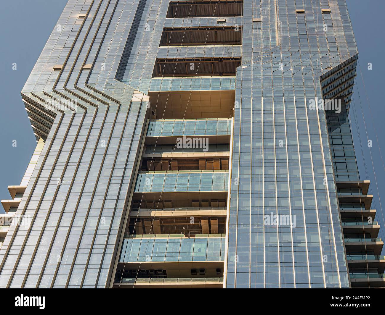 02 25 2024 Glass covered multi-storied Office Building behind the 30 ...