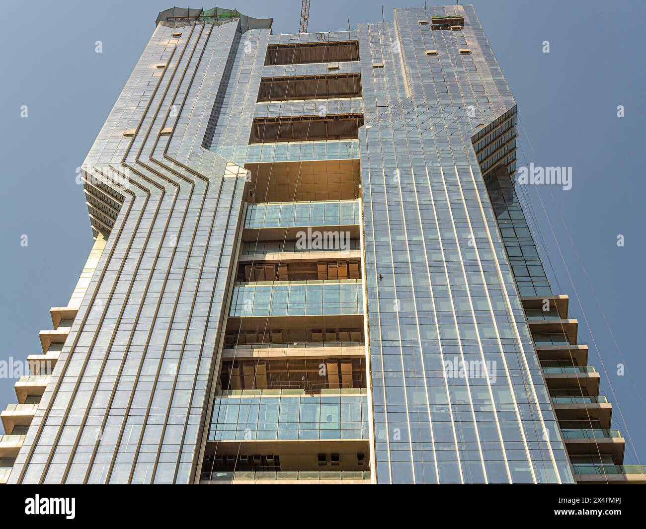 02 25 2024 Glass covered multi-storied Office Building behind the 30 ...