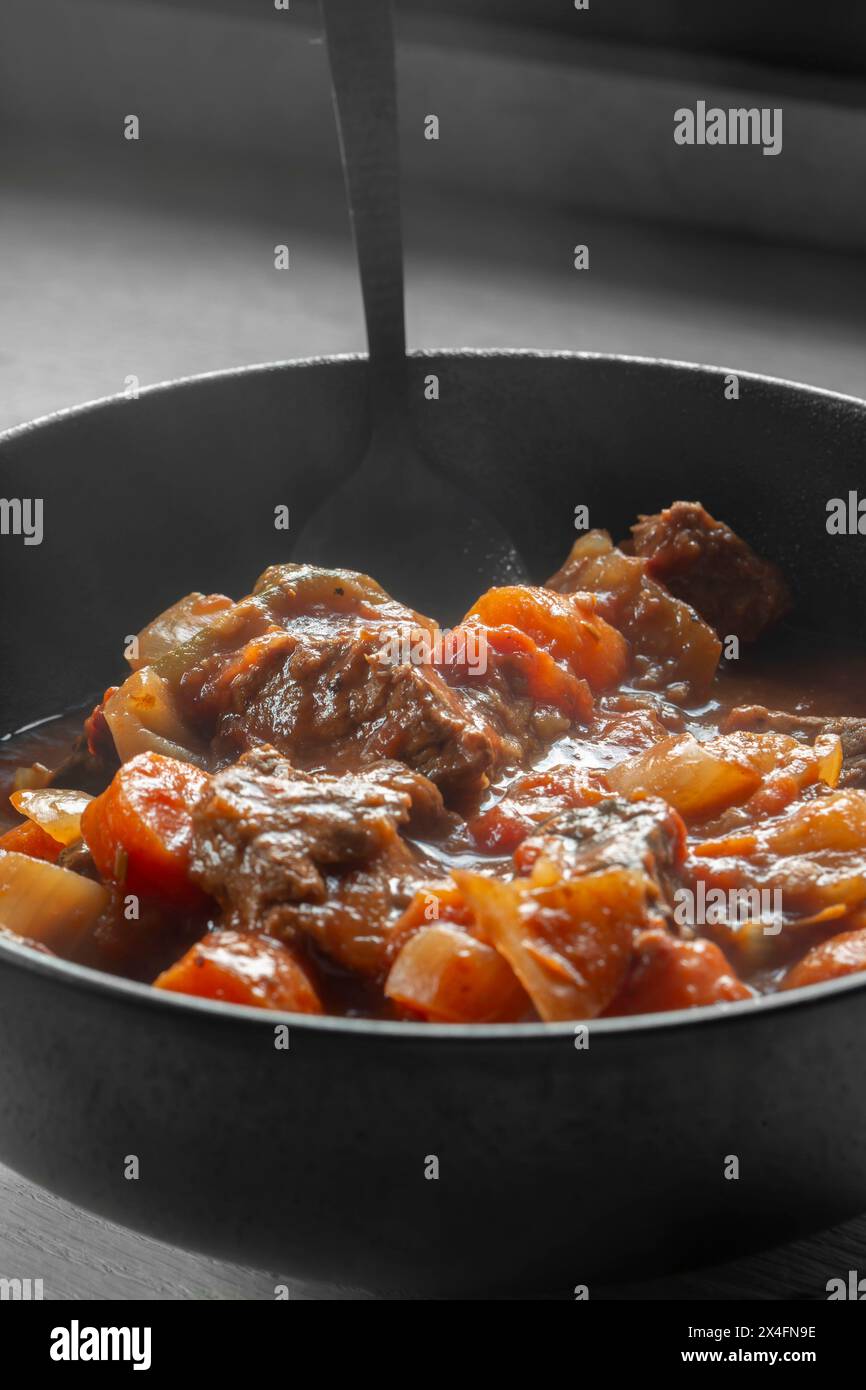 Beef casserole, with herbs and vegetables, in a red wine and tomato ...