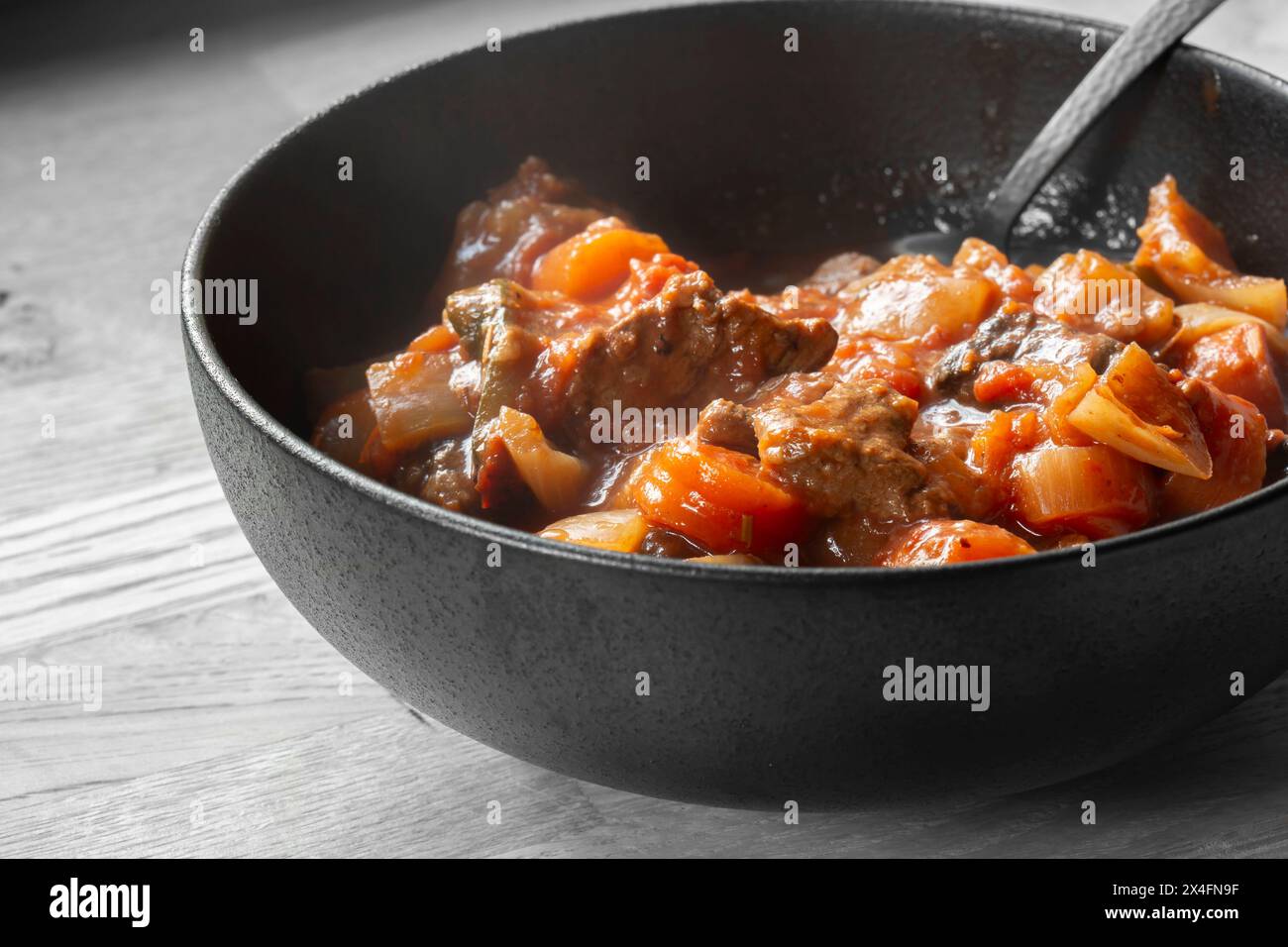 Beef casserole, with herbs and vegetables, in a red wine and tomato ...