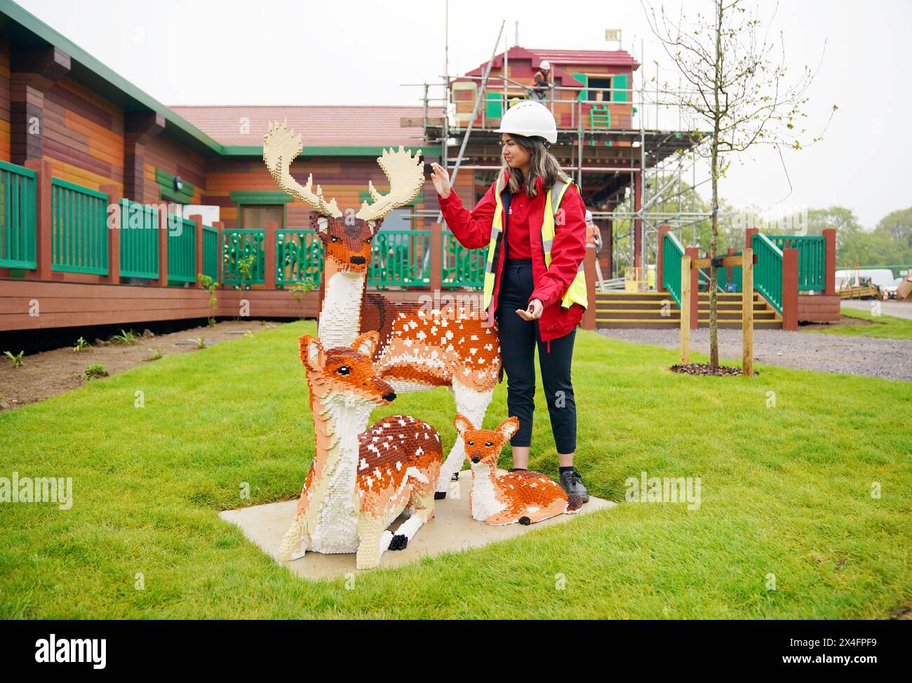 LEGOLAND Windsor Resort team member Jennifer Howlett adds pieces to a ...