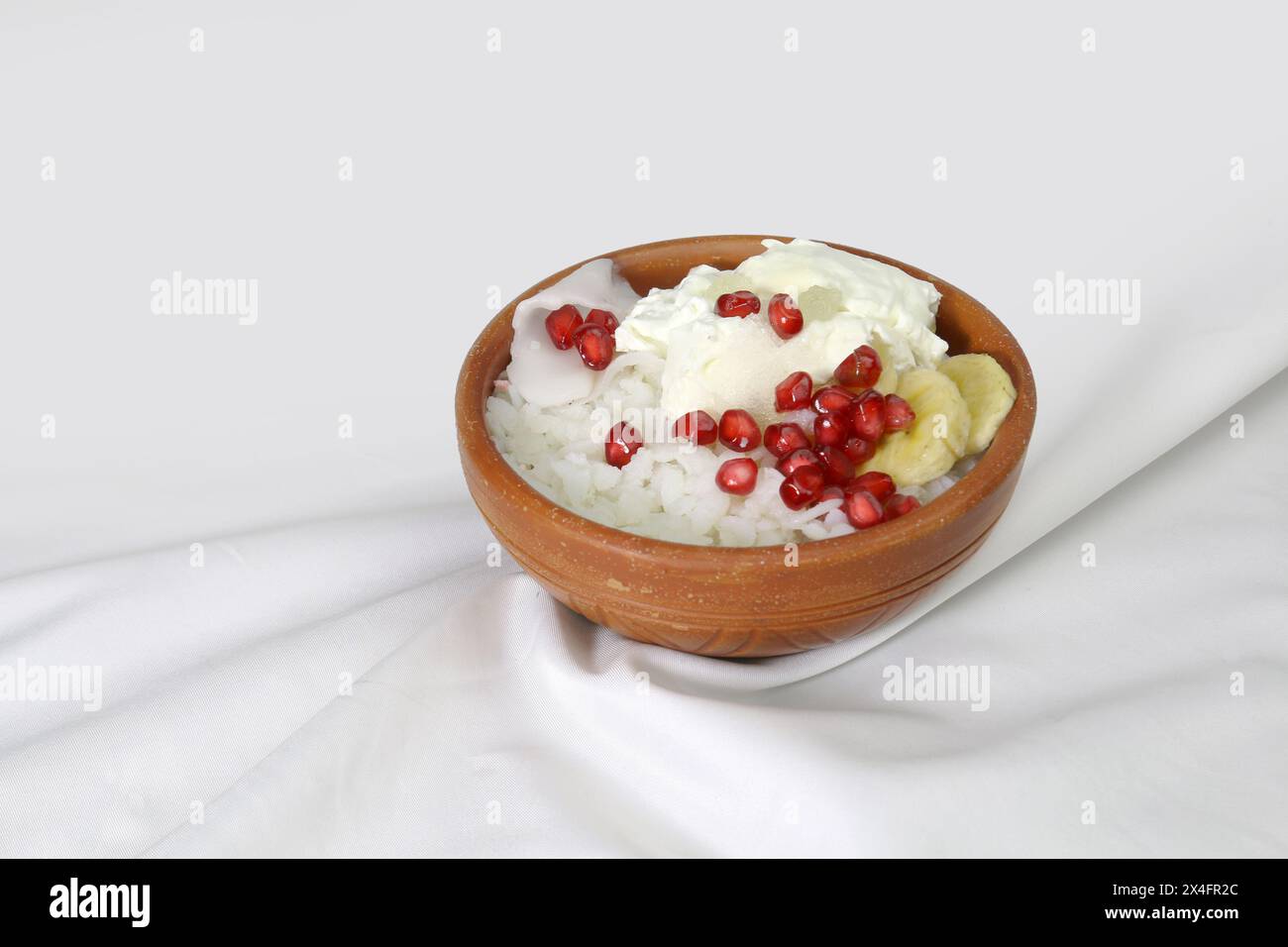 Doi Chira on clay bowl, traditional Bangale healthy and ice cool summer ...