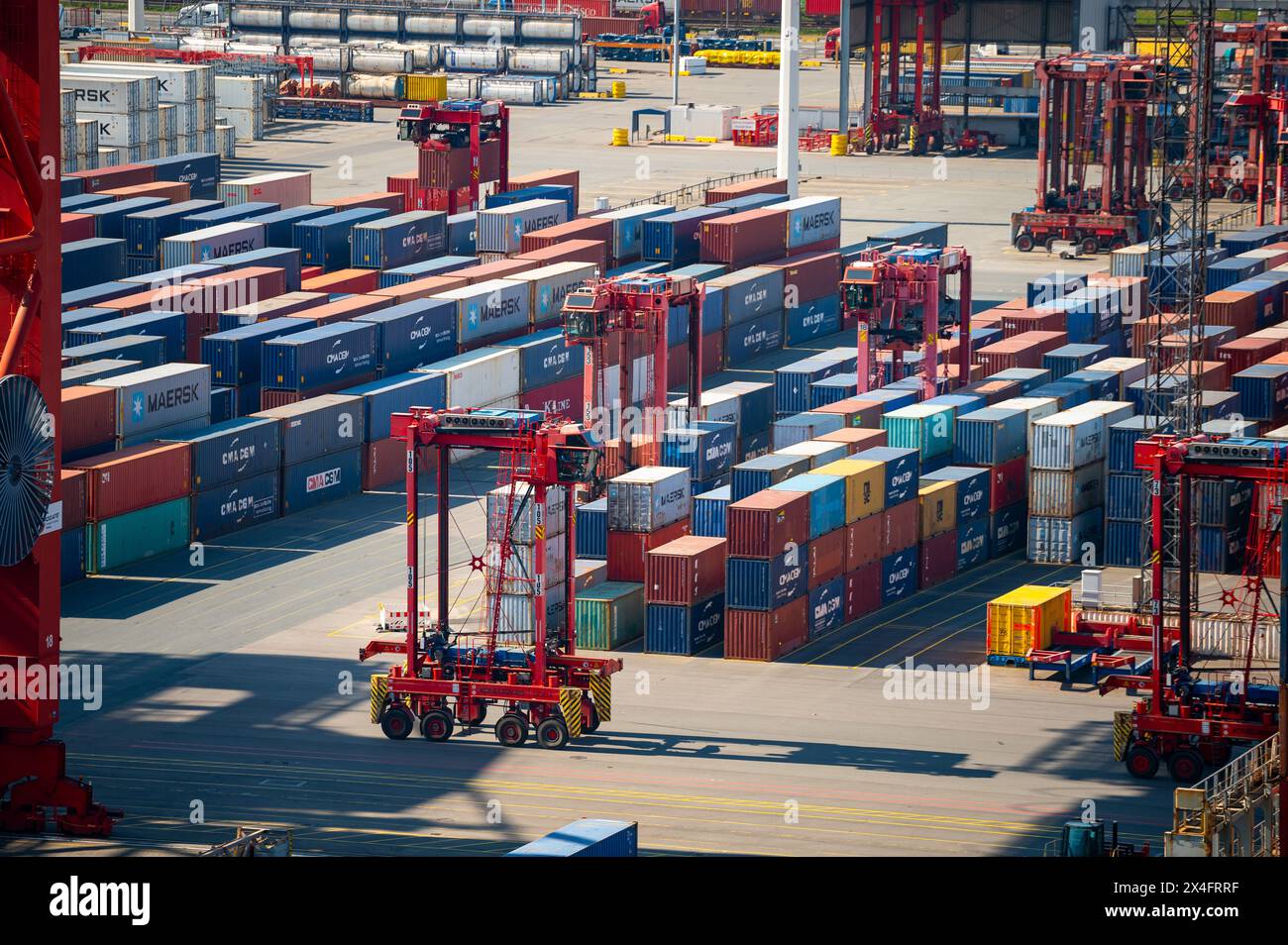 Hamburg, Germany. 02nd May, 2024. Straddle carriers move between ...