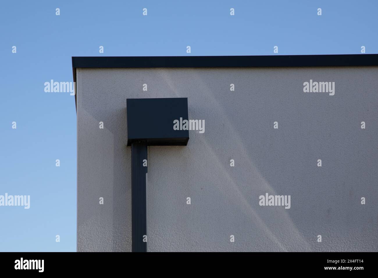 grey white edge of roof gutters of semi-detached houses aluminum gutter ...