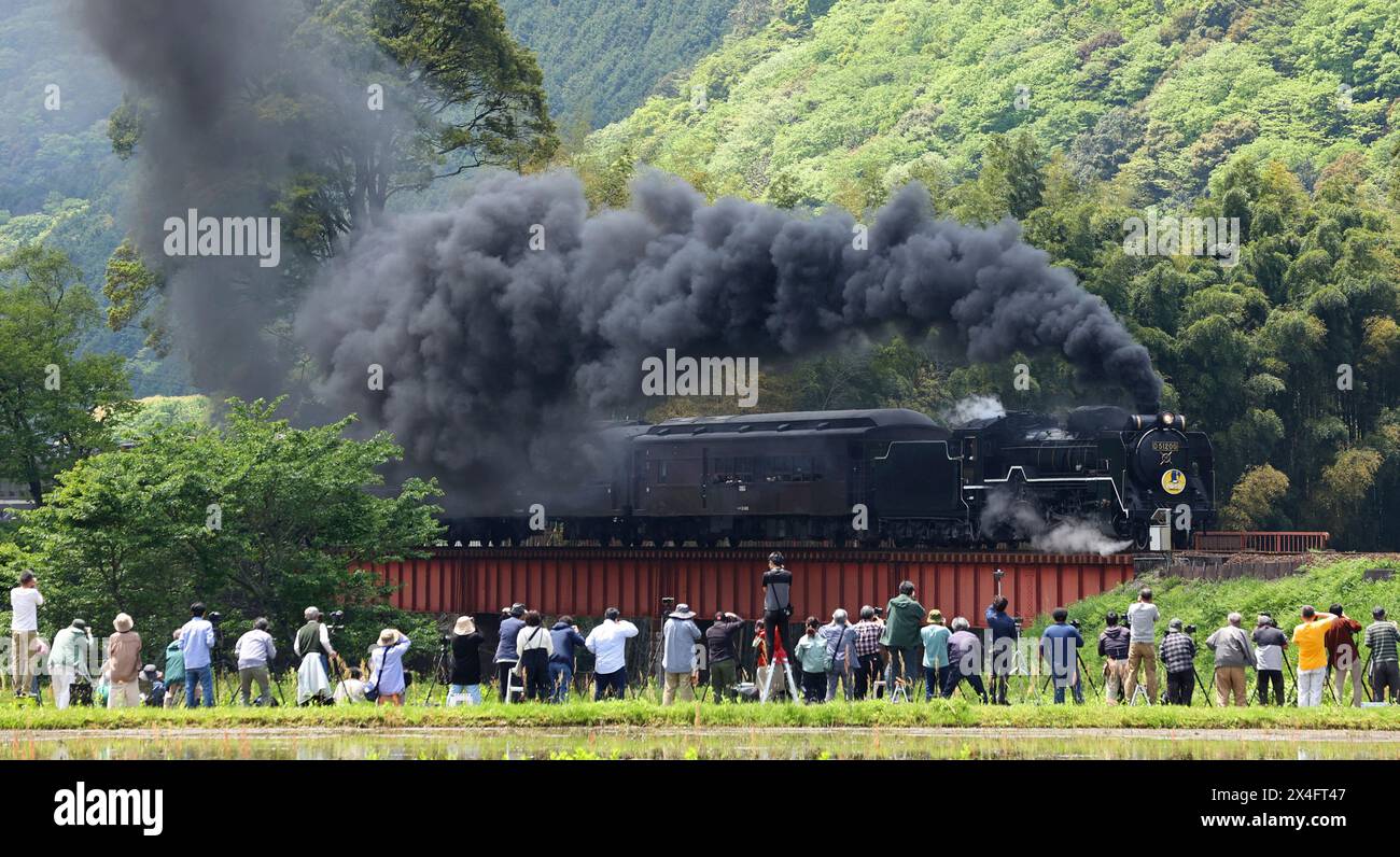 A Steam Locomotive "Yamaguchi" goes through mountains in Yamaguchi City ...