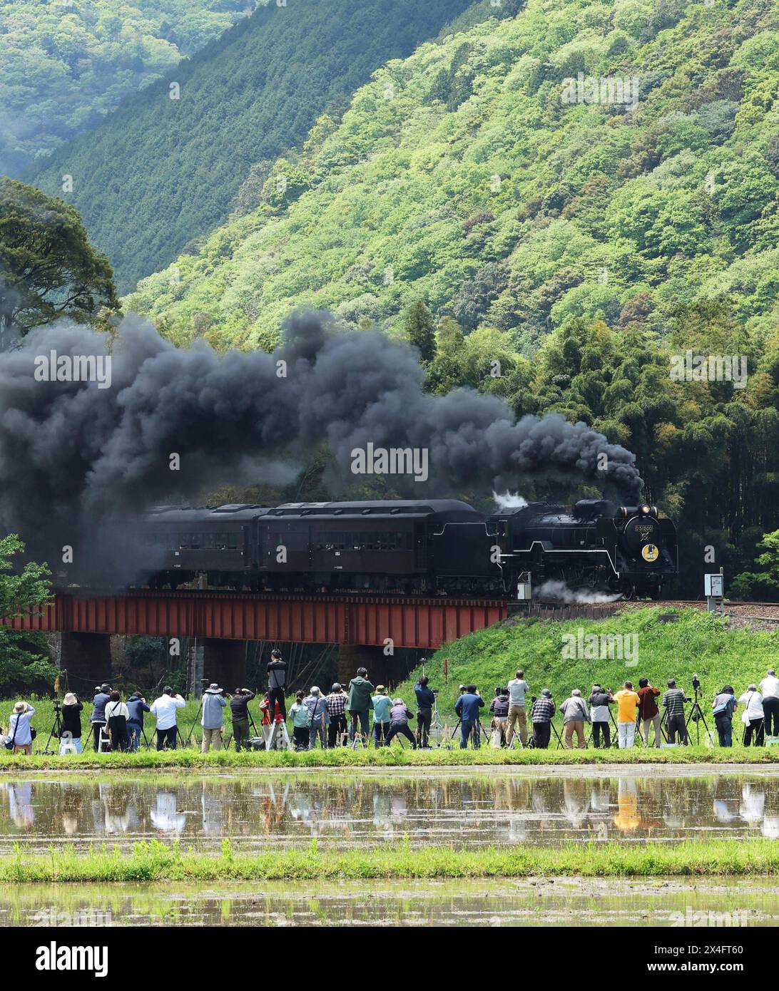 A Steam Locomotive "Yamaguchi" goes through mountains in Yamaguchi City ...
