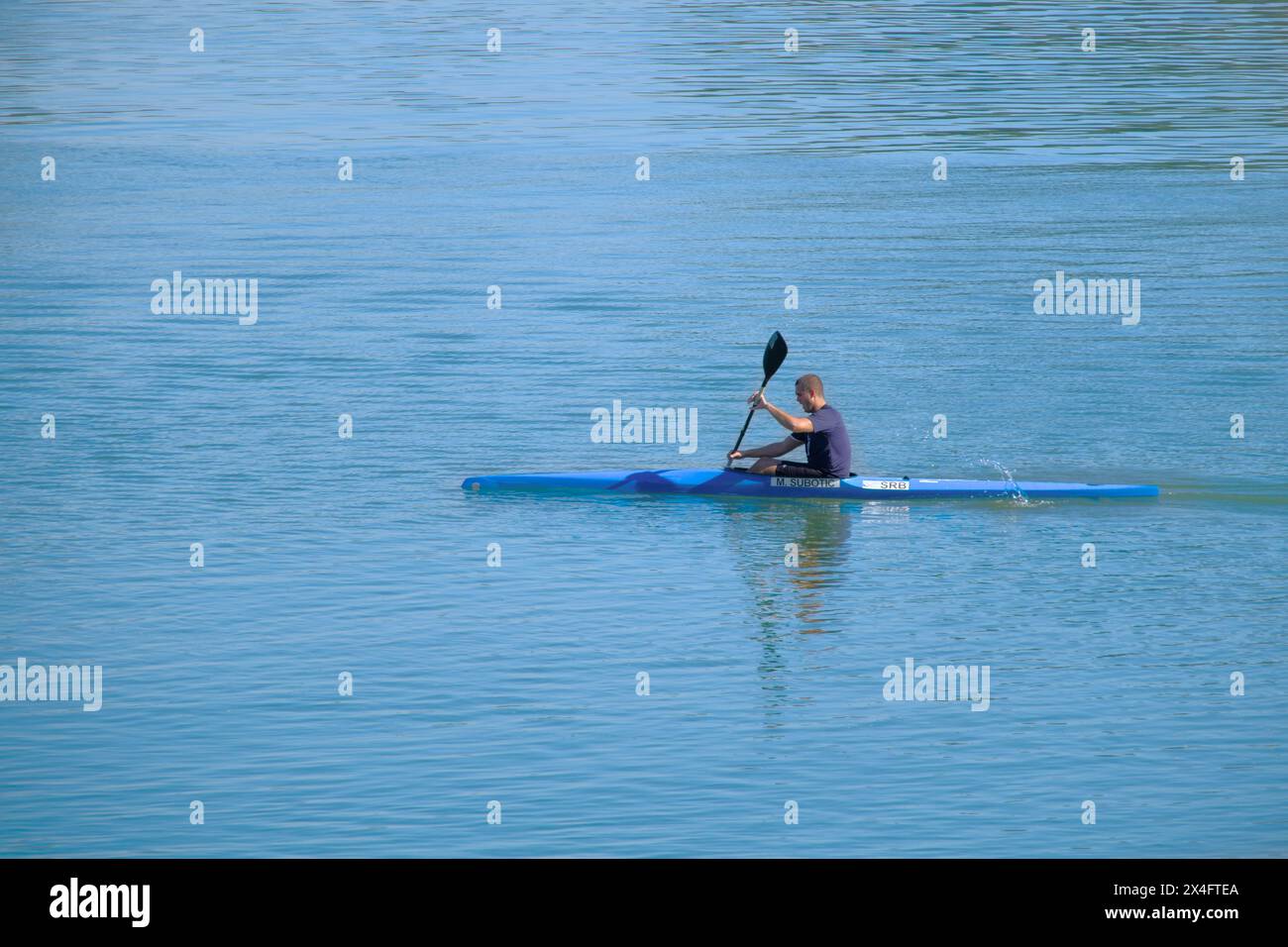 Man kayaker on quiet river hi-res stock photography and images - Alamy