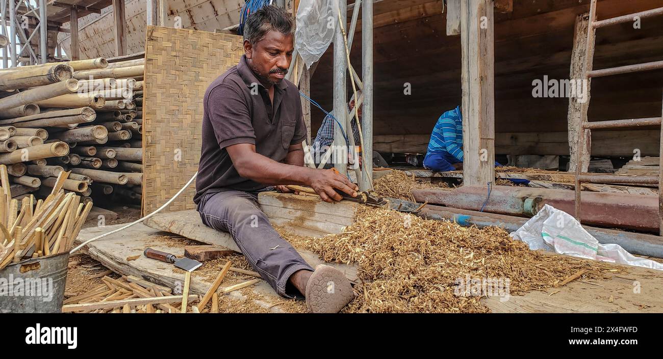 Shipbuilders at the traditional dhow boat factory of Sur, Ash Sharqiyah ...