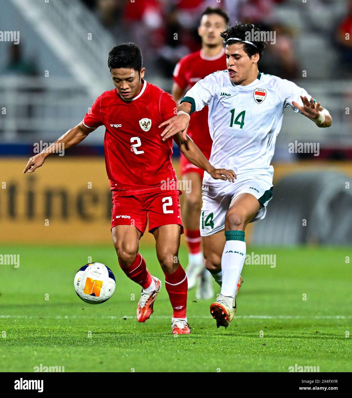 Doha, Qatar. 2nd May, 2024. Ilham Rio Fahmi (L) of Indonesia vies with ...