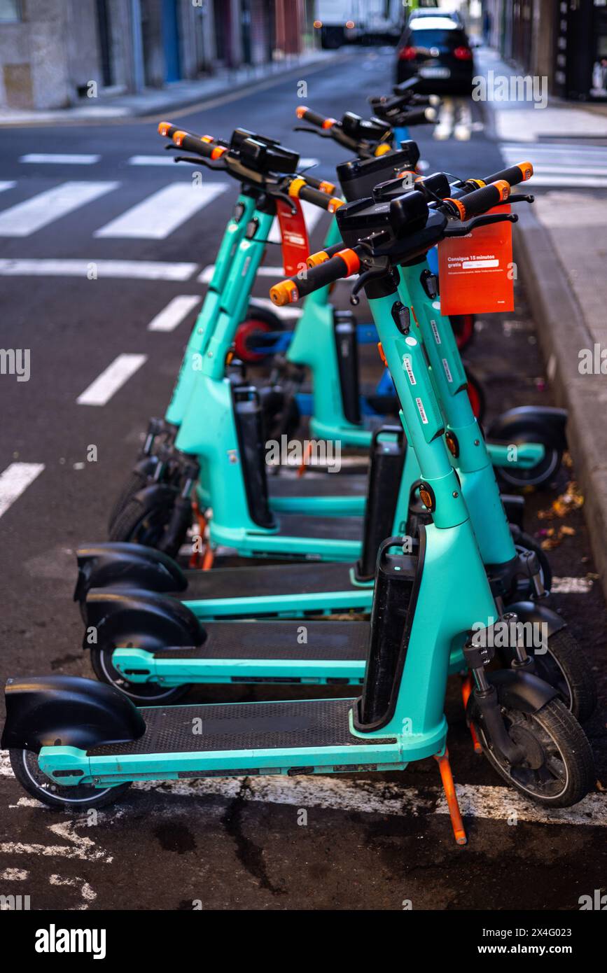 Rental electric scooters Stock Photo - Alamy