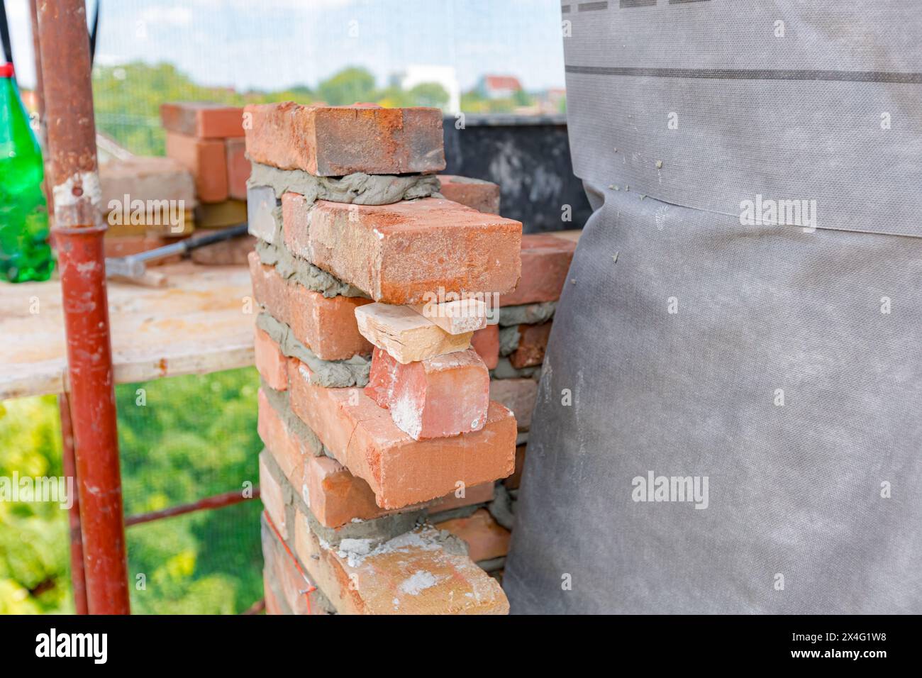 Corner, facade of outdoor brick wall, between is fiber as insulating ...