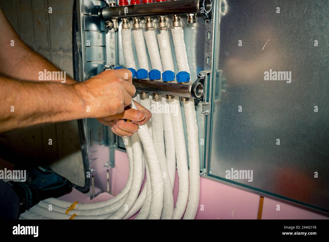 Worker assembly new brass distribution system manifold valves mounted ...