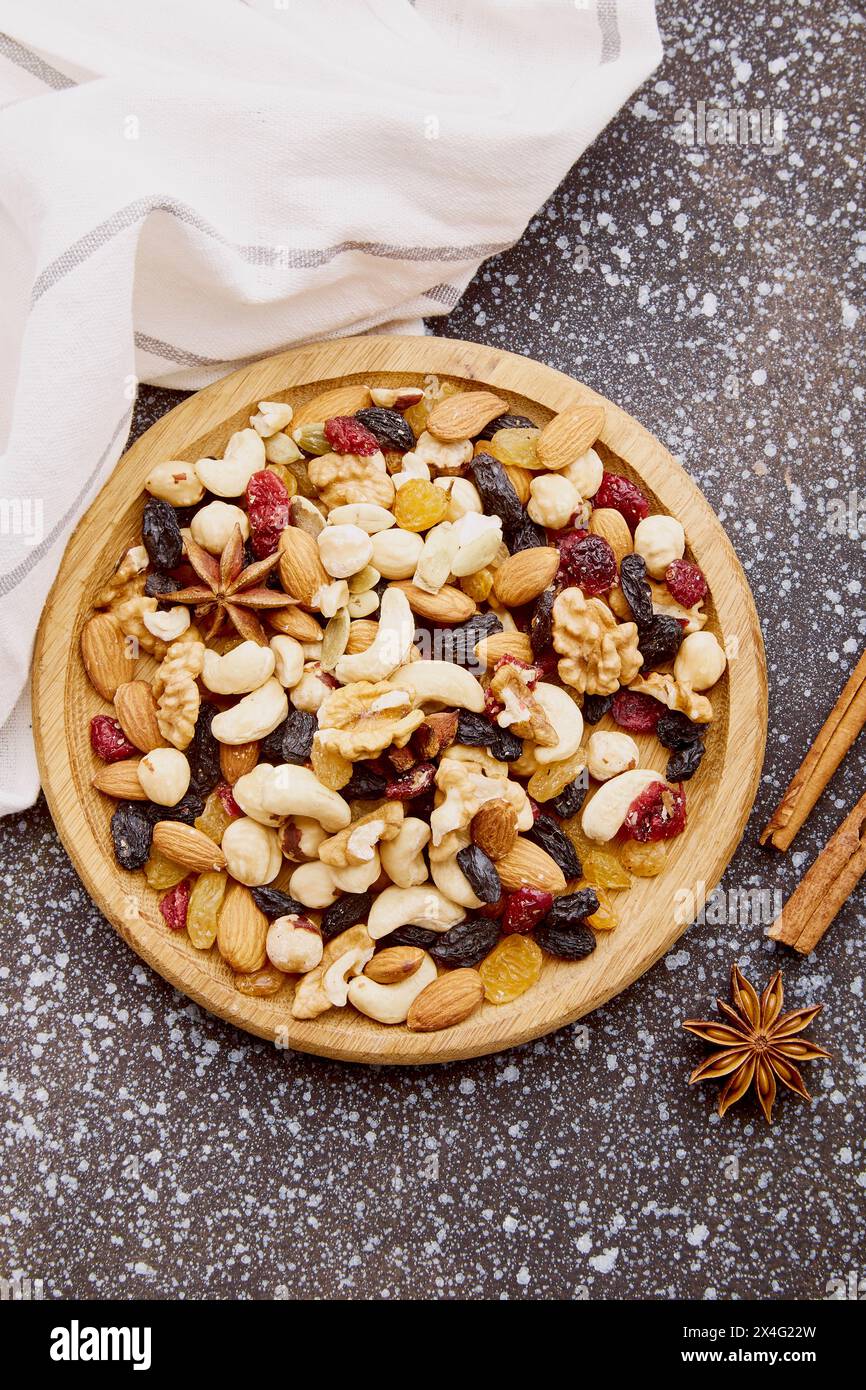 Aesthetic wooden bowl of assorted nuts top view. Healthy food and ...