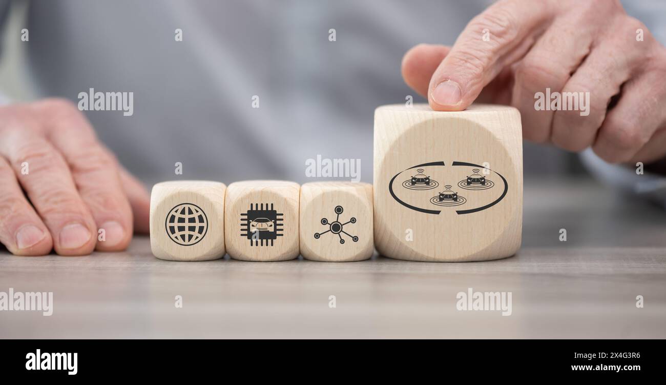Wooden blocks with symbol of connected cars concept Stock Photo - Alamy