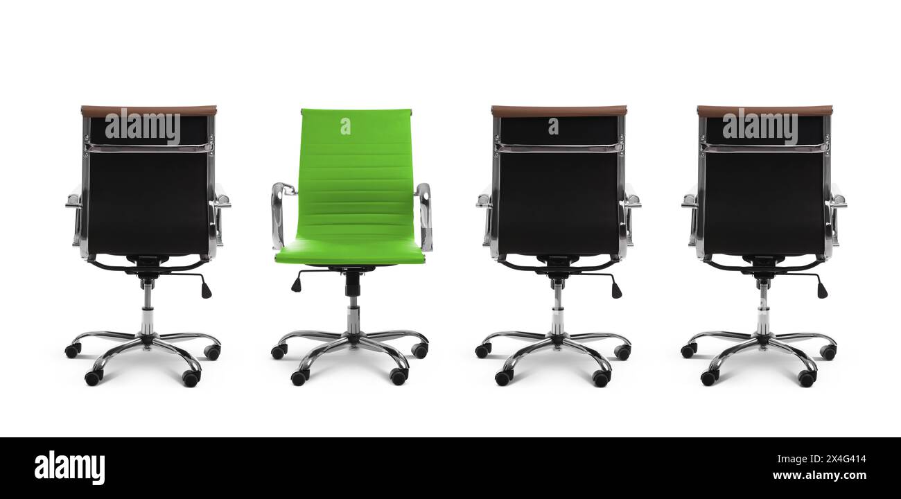 Vacant position. Green office chair among black ones on white ...